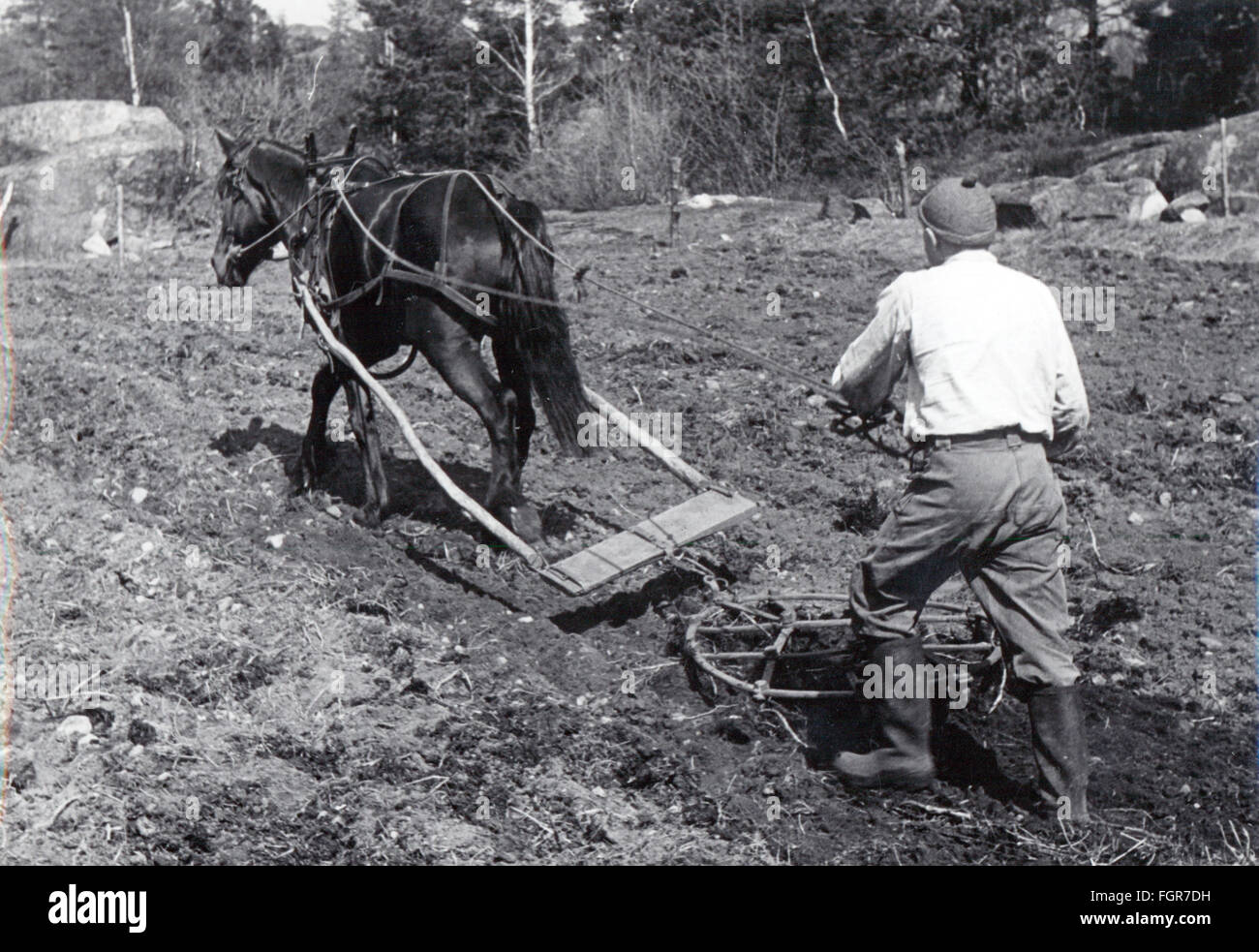 Farmers harrowing fields hi-res stock photography and images - Alamy