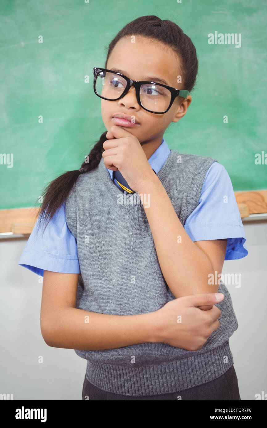 Curious looking student in class Stock Photo - Alamy