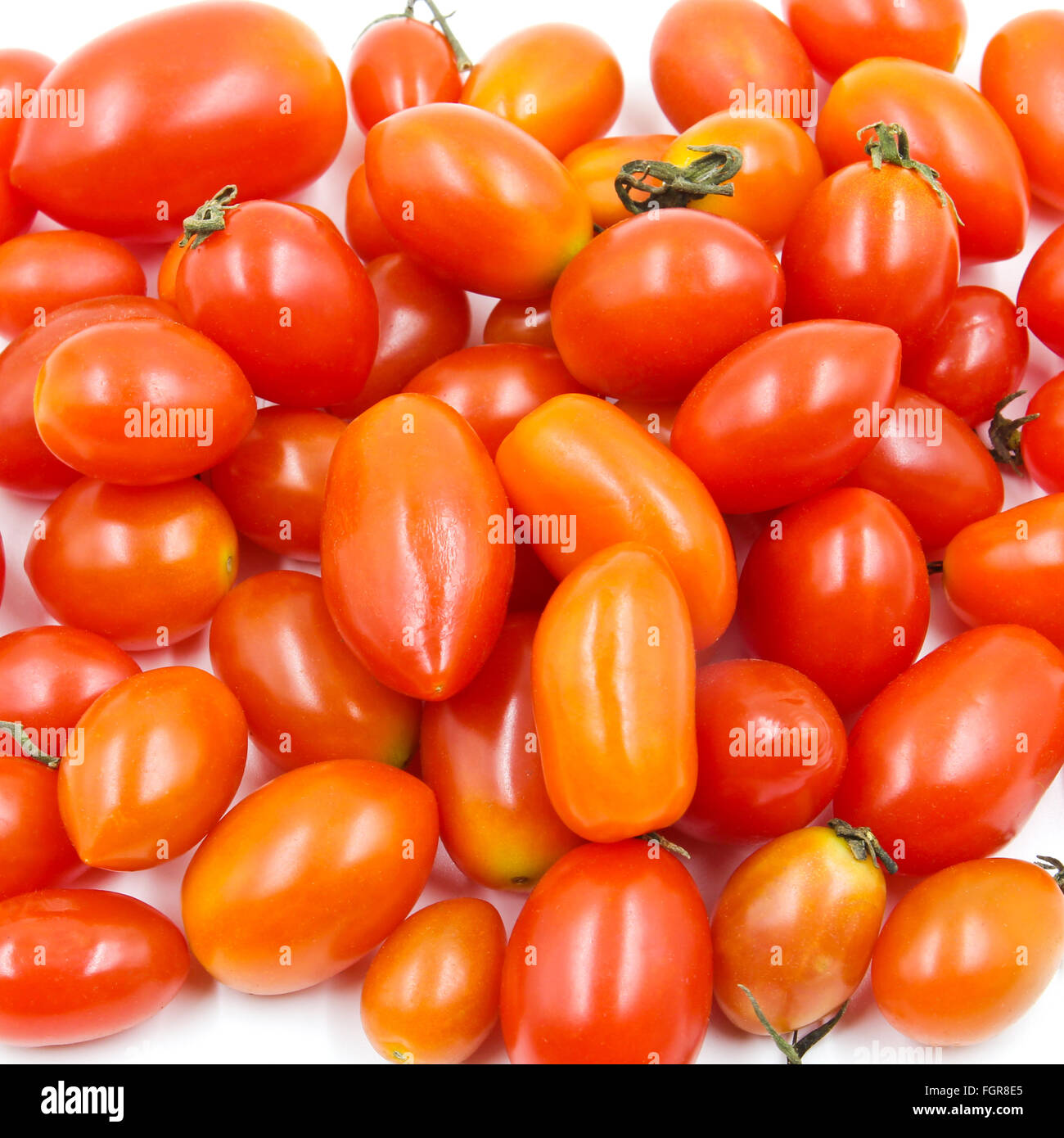 Grape or cherry tomatoes isolated on white background Stock Photo - Alamy