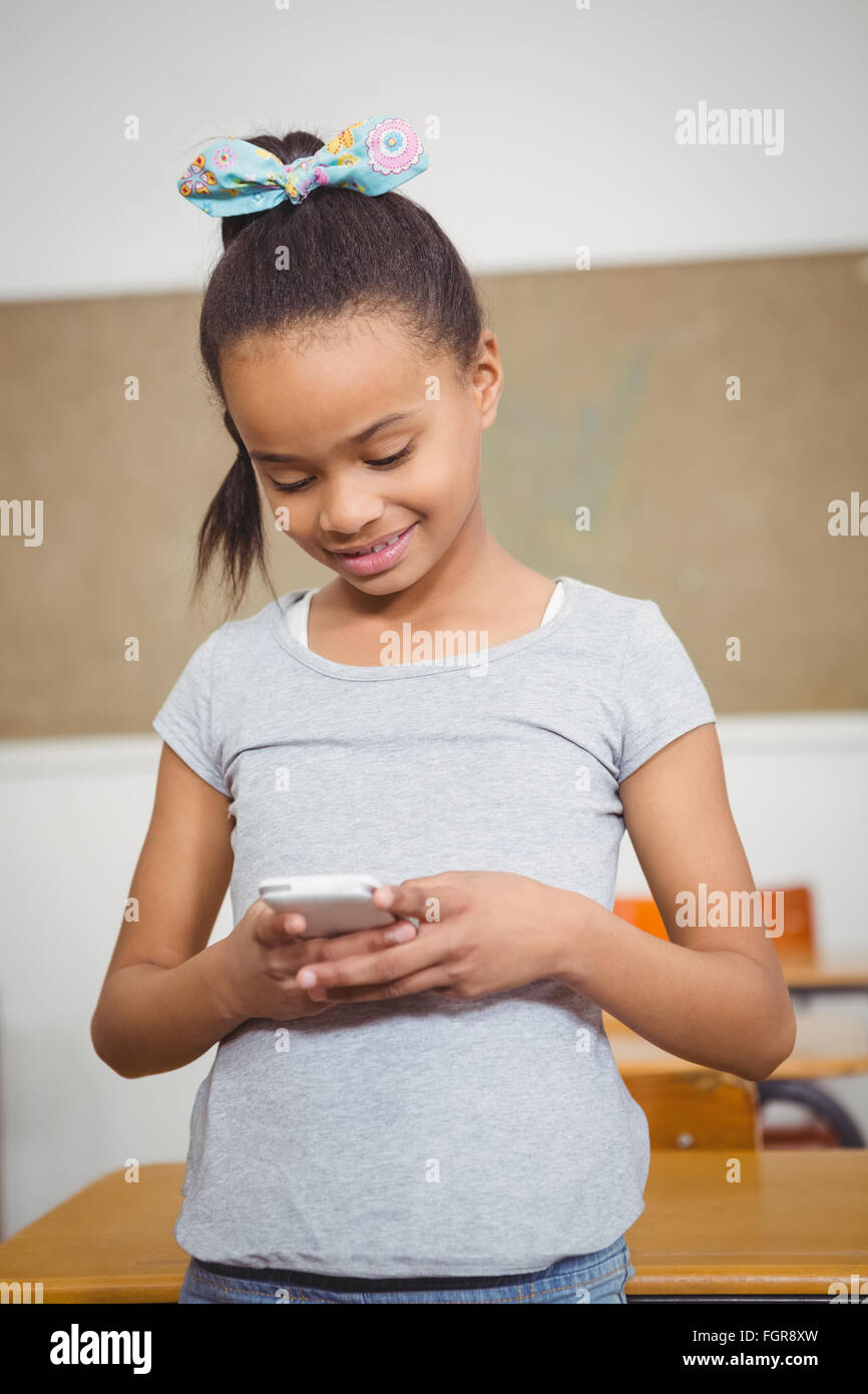 Girl using smartphone in class hi-res stock photography and images - Alamy
