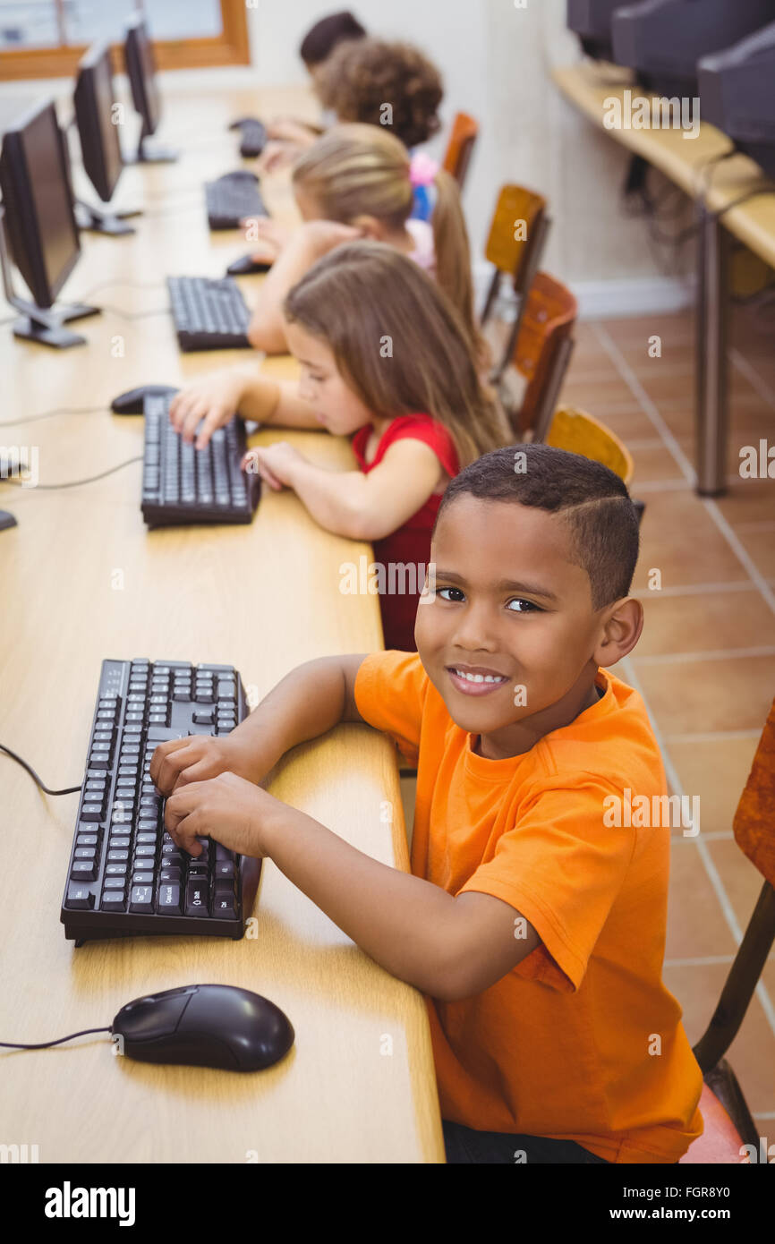 Smiling student using a computer Stock Photo - Alamy