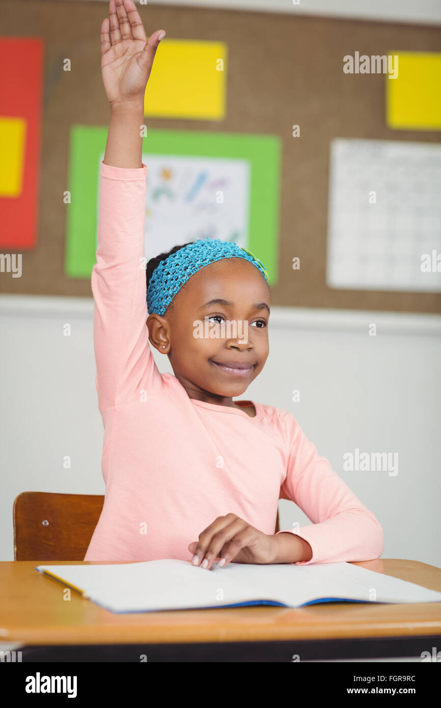 Primary school child hand up classroom hi-res stock photography and ...