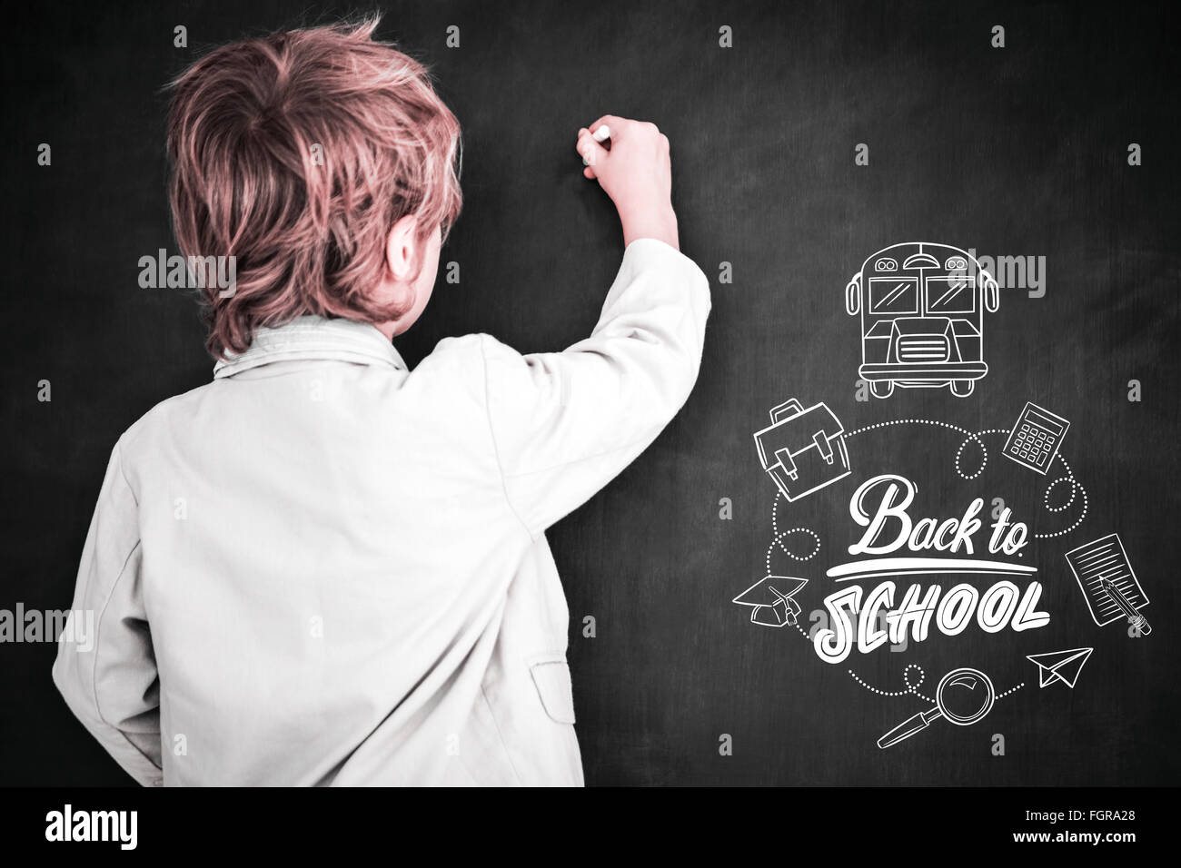 Composite image of cute pupil writing on board Stock Photo - Alamy