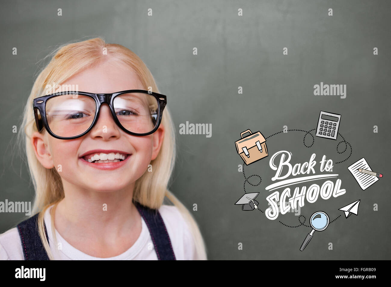 Composite image of cute pupil smiling Stock Photo - Alamy