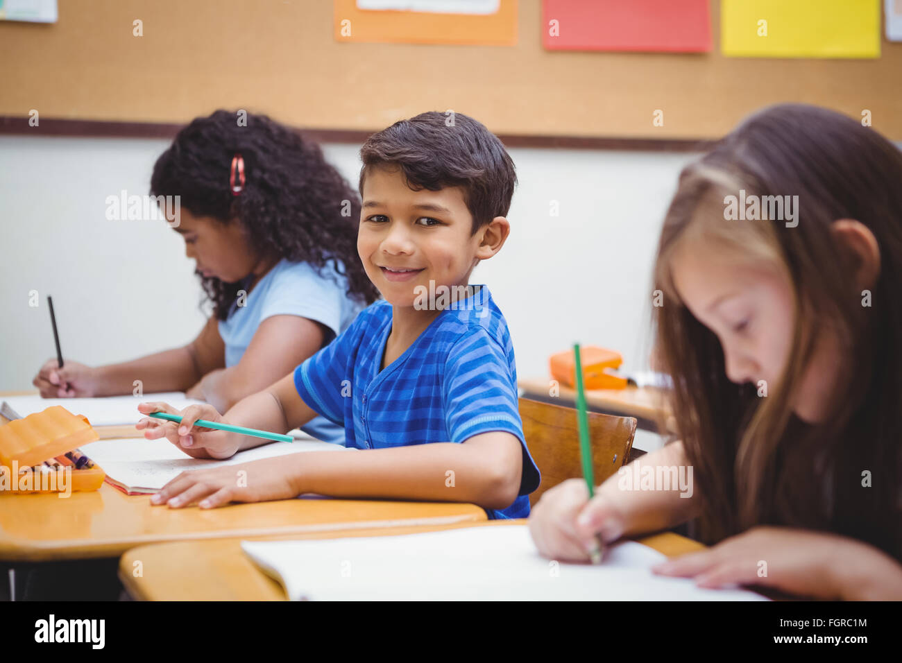 Busy students working on class work Stock Photo - Alamy