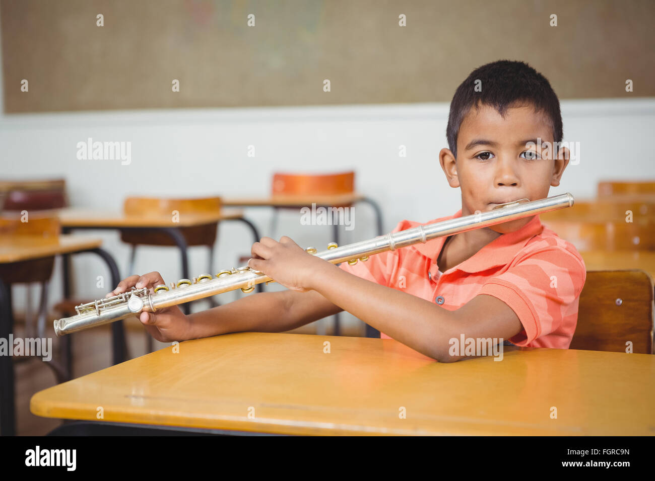 Student using a flute in class Stock Photo - Alamy