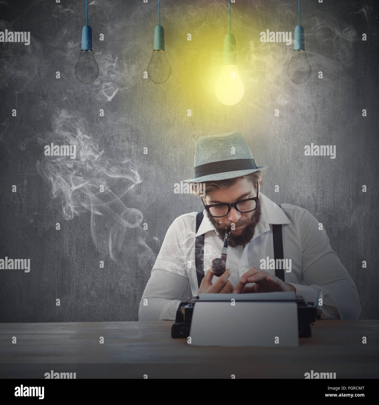 Composite image of hipster smoking pipe while working at desk Stock ...