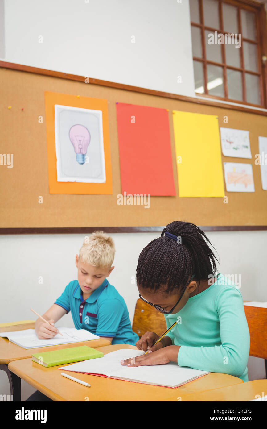 Busy students working on class work Stock Photo - Alamy