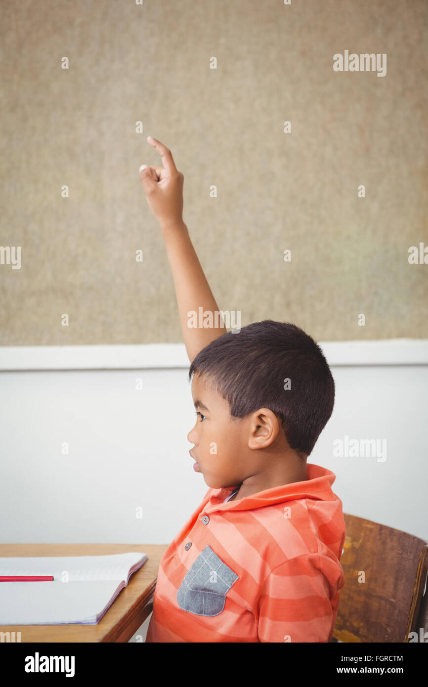 Student raising hand to ask a question Stock Photo - Alamy