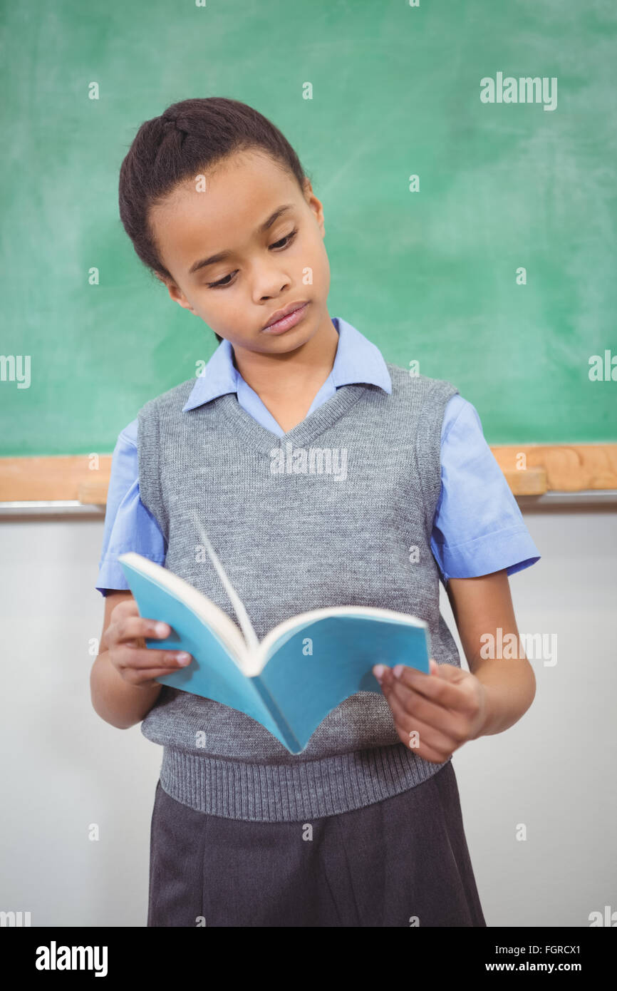 Smart student reading a book Stock Photo - Alamy