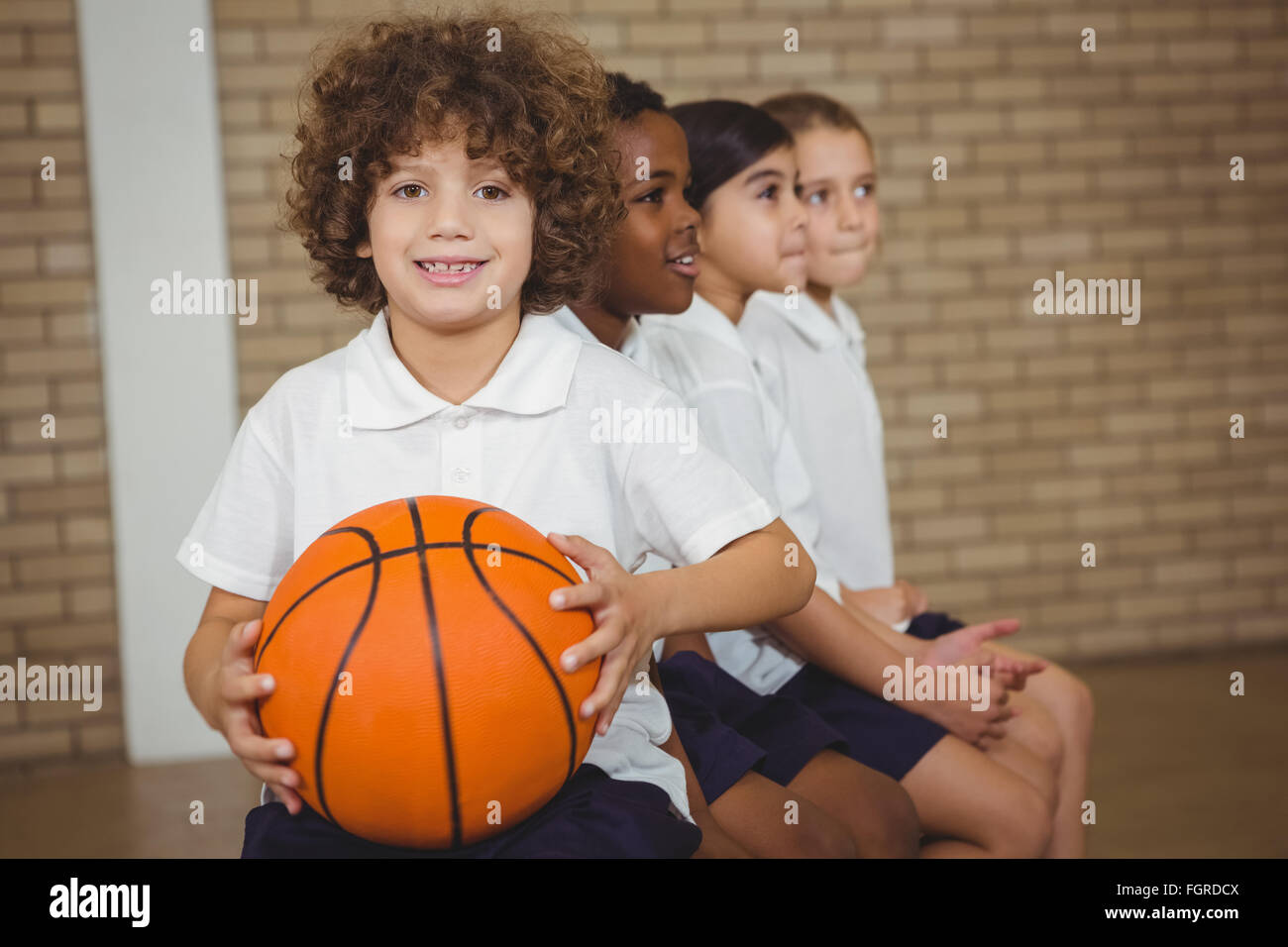 Male student school uniform holding hi-res stock photography and images ...