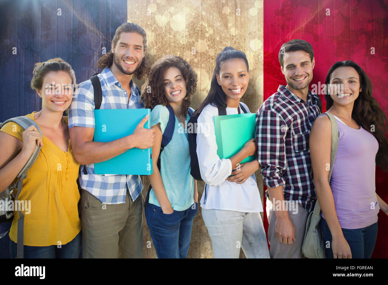 Composite image of smiling group of students standing in a row Stock ...