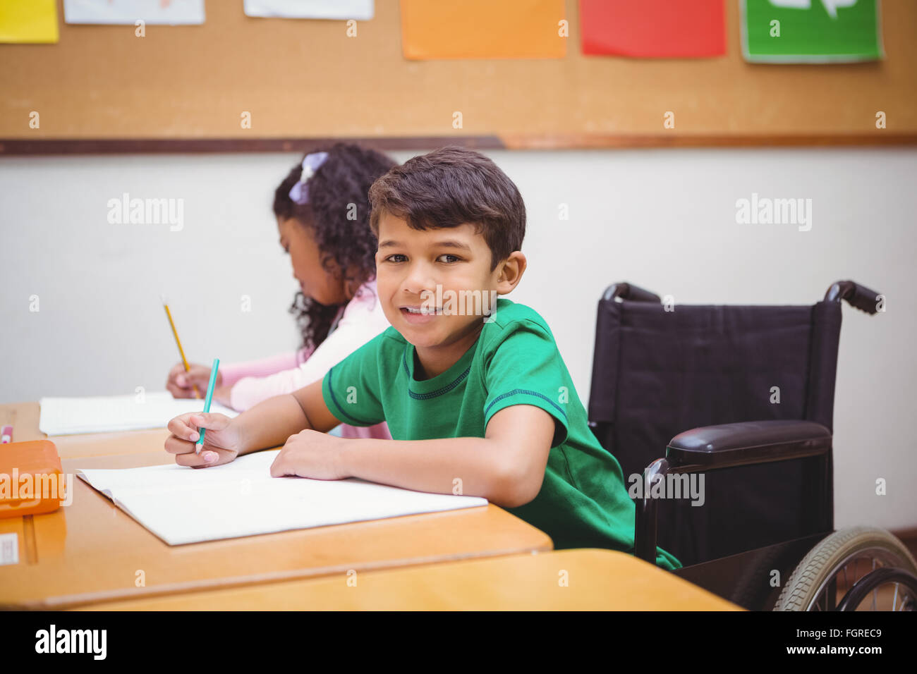 Wheelchair student in classroom hi-res stock photography and images - Alamy