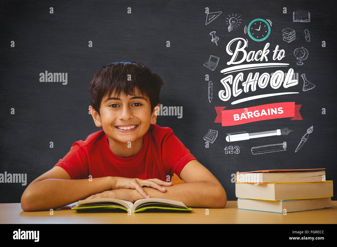 Composite image of cute boy reading book in library Stock Photo - Alamy