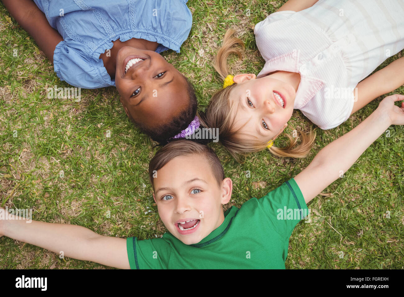 Smiling students looking at the camera Stock Photo - Alamy