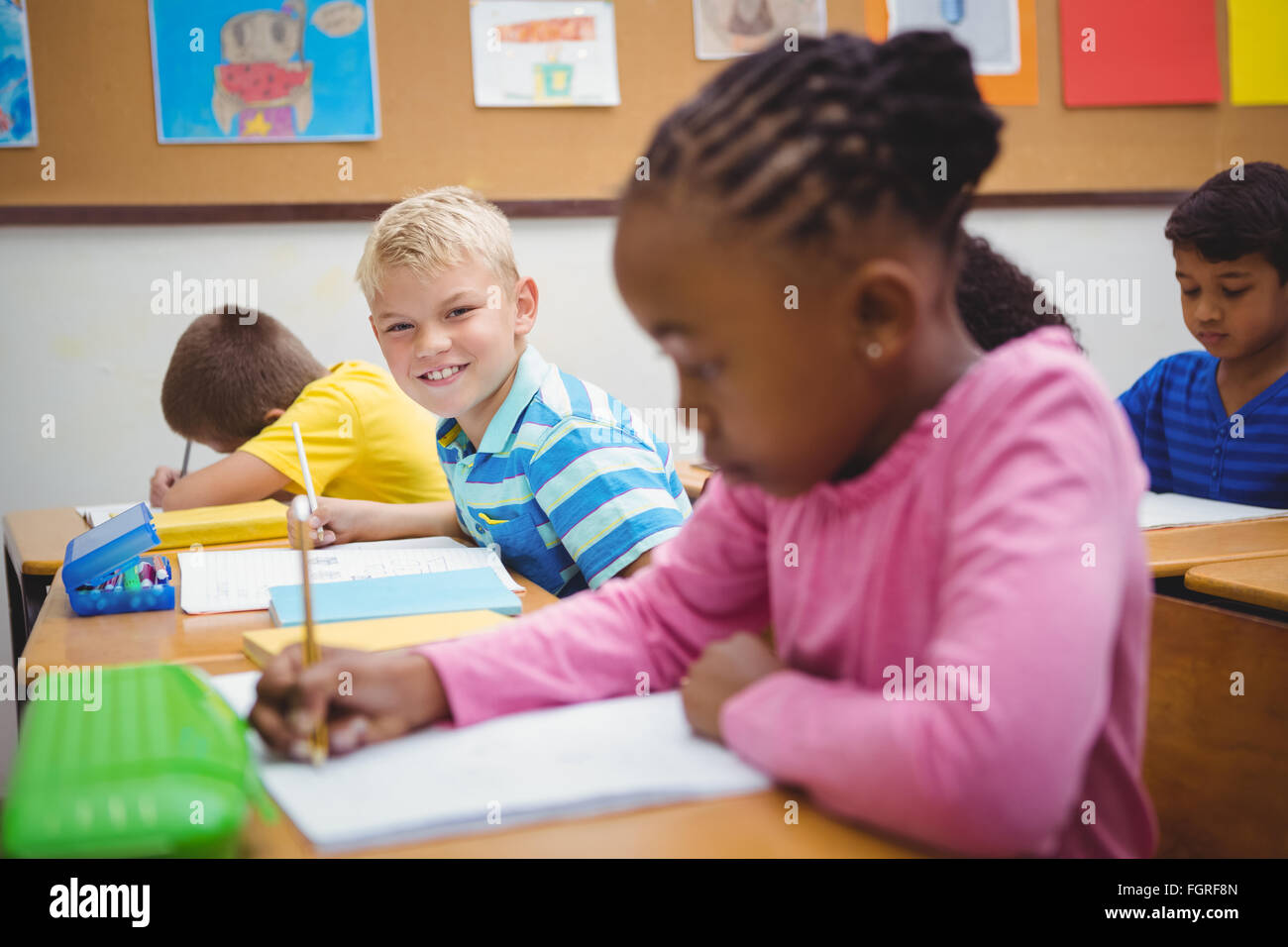 Busy students working on class work Stock Photo - Alamy