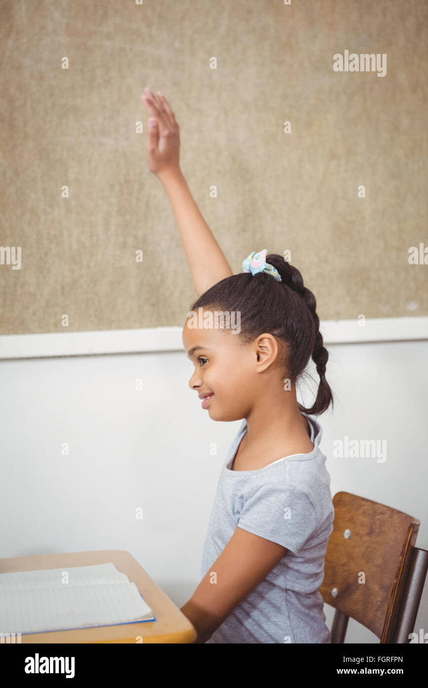 Student raising hand to ask a question Stock Photo - Alamy