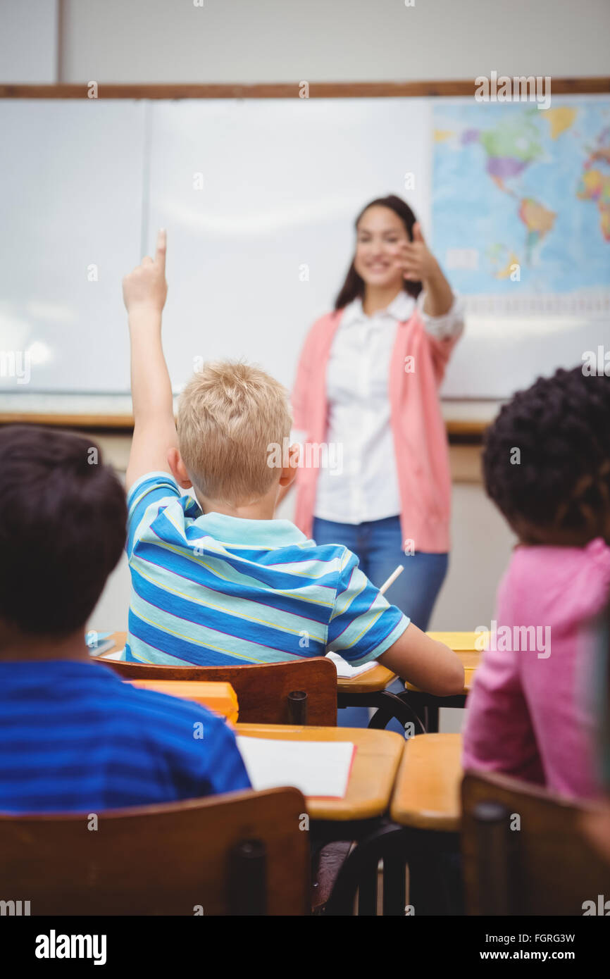Student raising hand to ask a question Stock Photo - Alamy