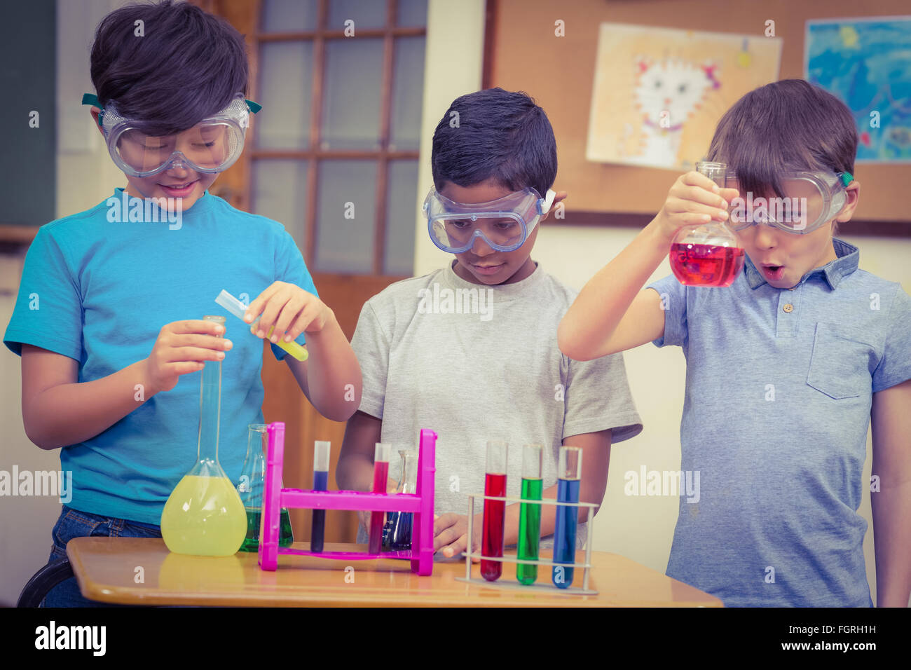 Pupils at science lesson in classroom Stock Photo - Alamy