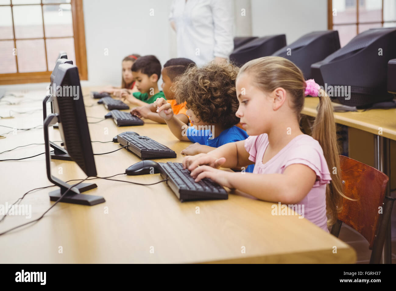 Students using computers in the classroom Stock Photo - Alamy