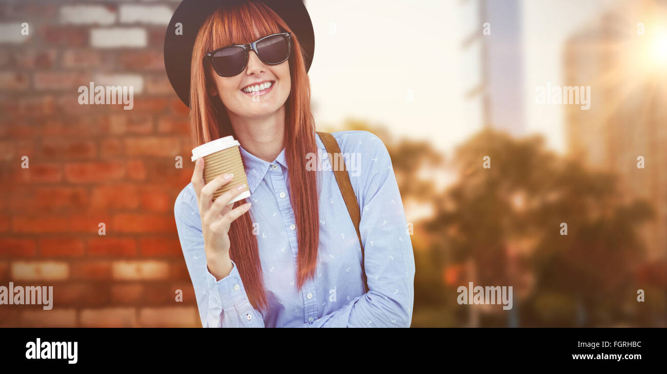 Composite image of smiling hipster woman drinking coffee Stock Photo ...