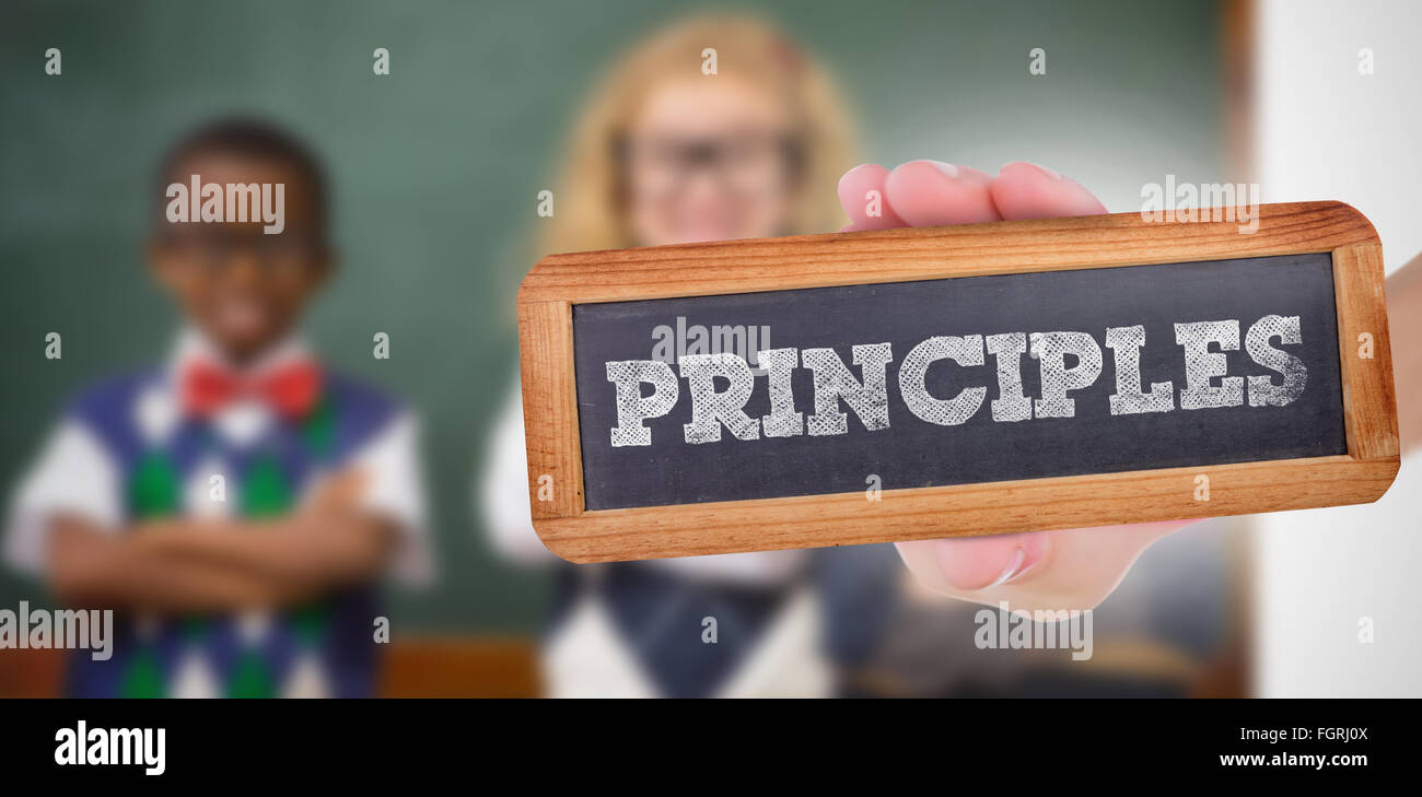 Principles against pupils smiling at camera with arms crossed Stock ...