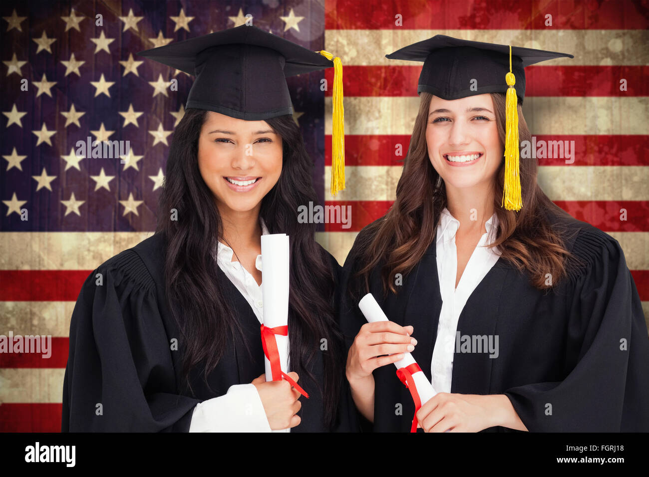 Composite image of two friends stand together after graduating Stock ...