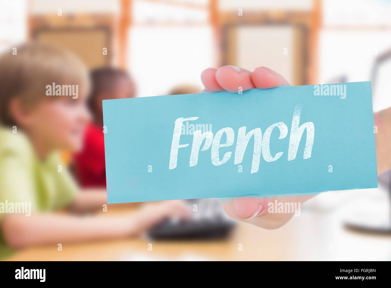French against cute pupils in computer class Stock Photo - Alamy