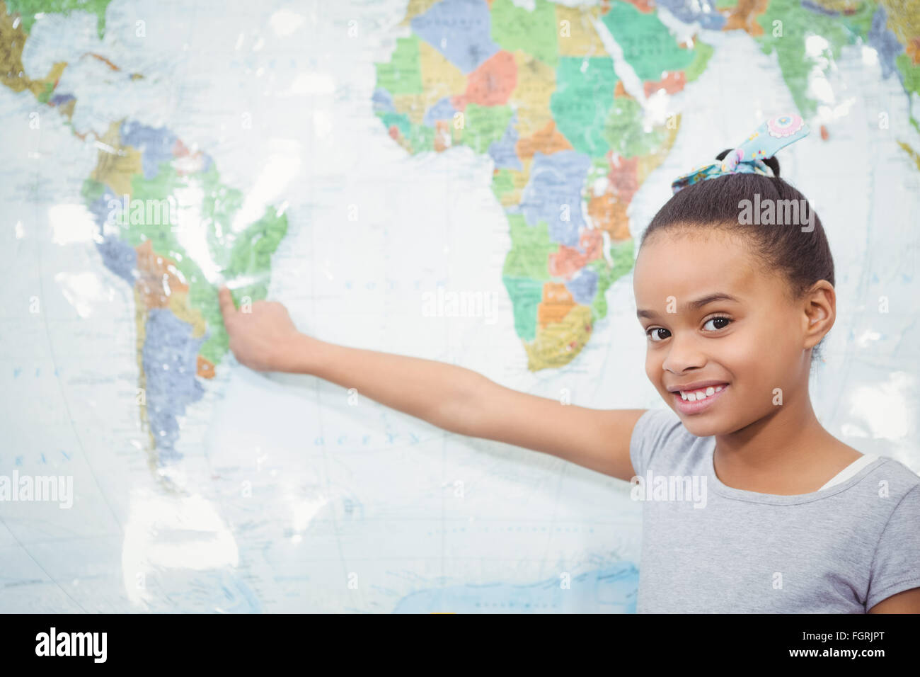 Child pointing world map hi-res stock photography and images - Alamy