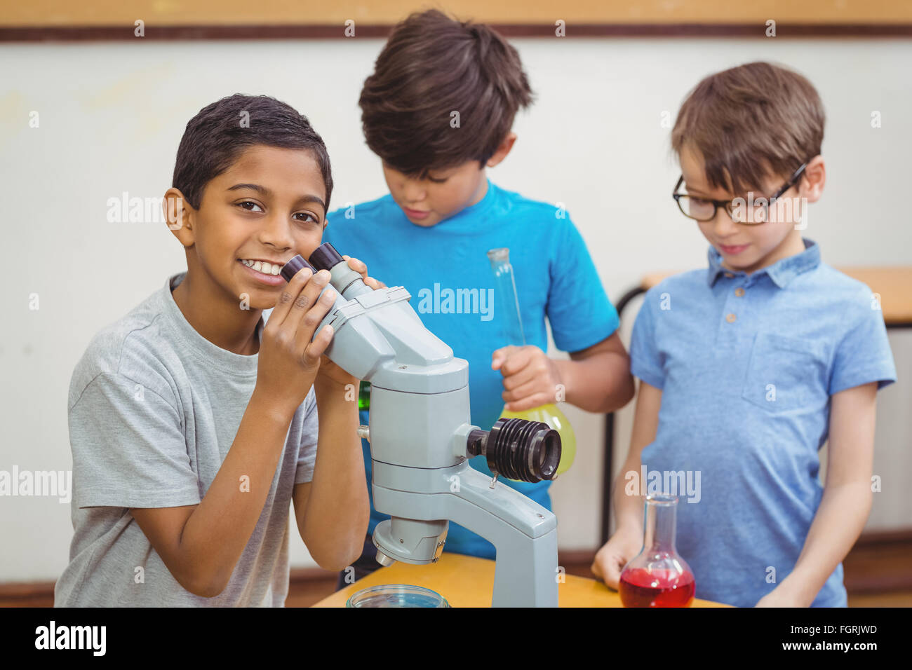 Pupils at science lesson in classroom Stock Photo - Alamy
