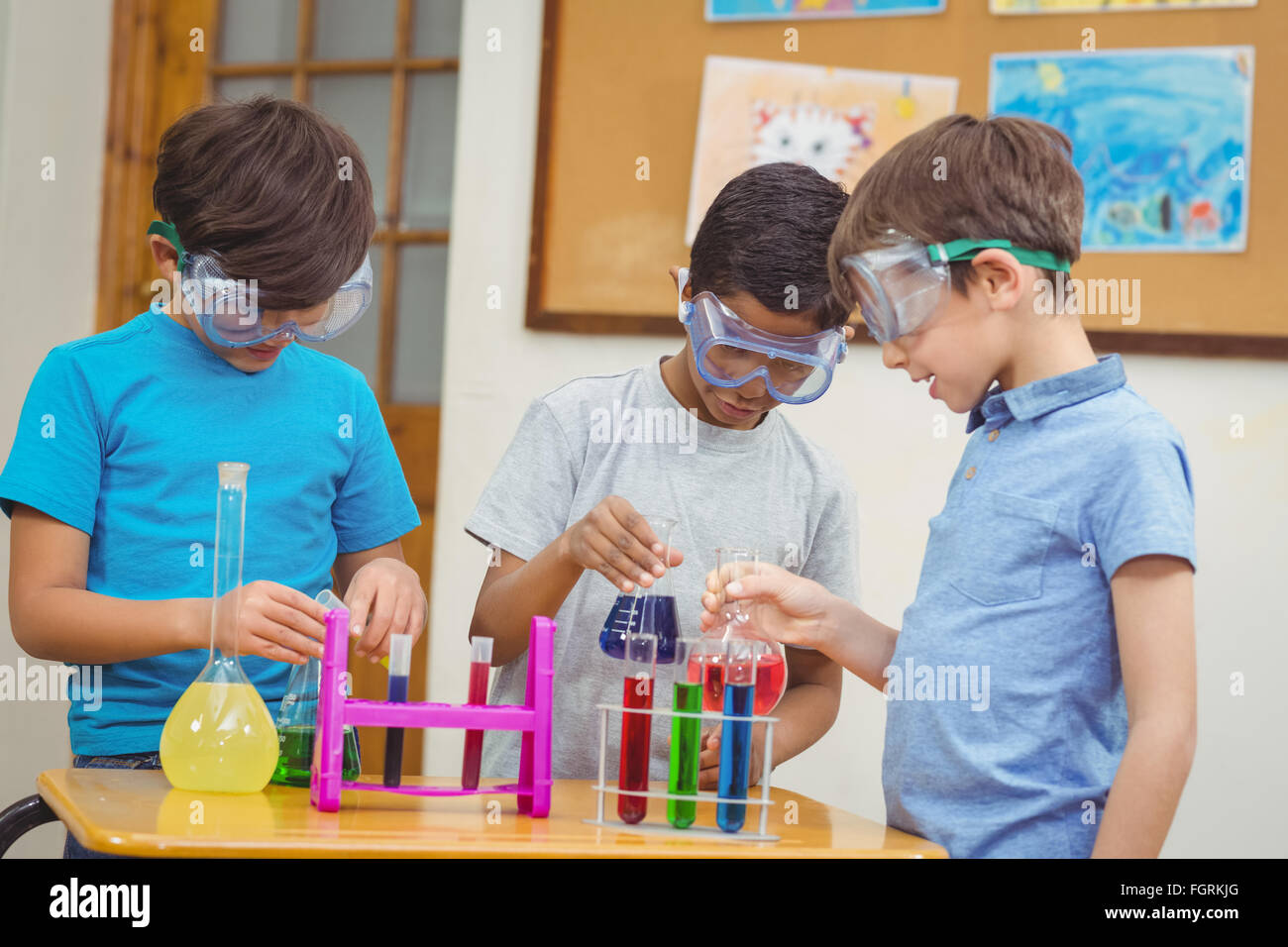 Pupils at science lesson in classroom Stock Photo - Alamy