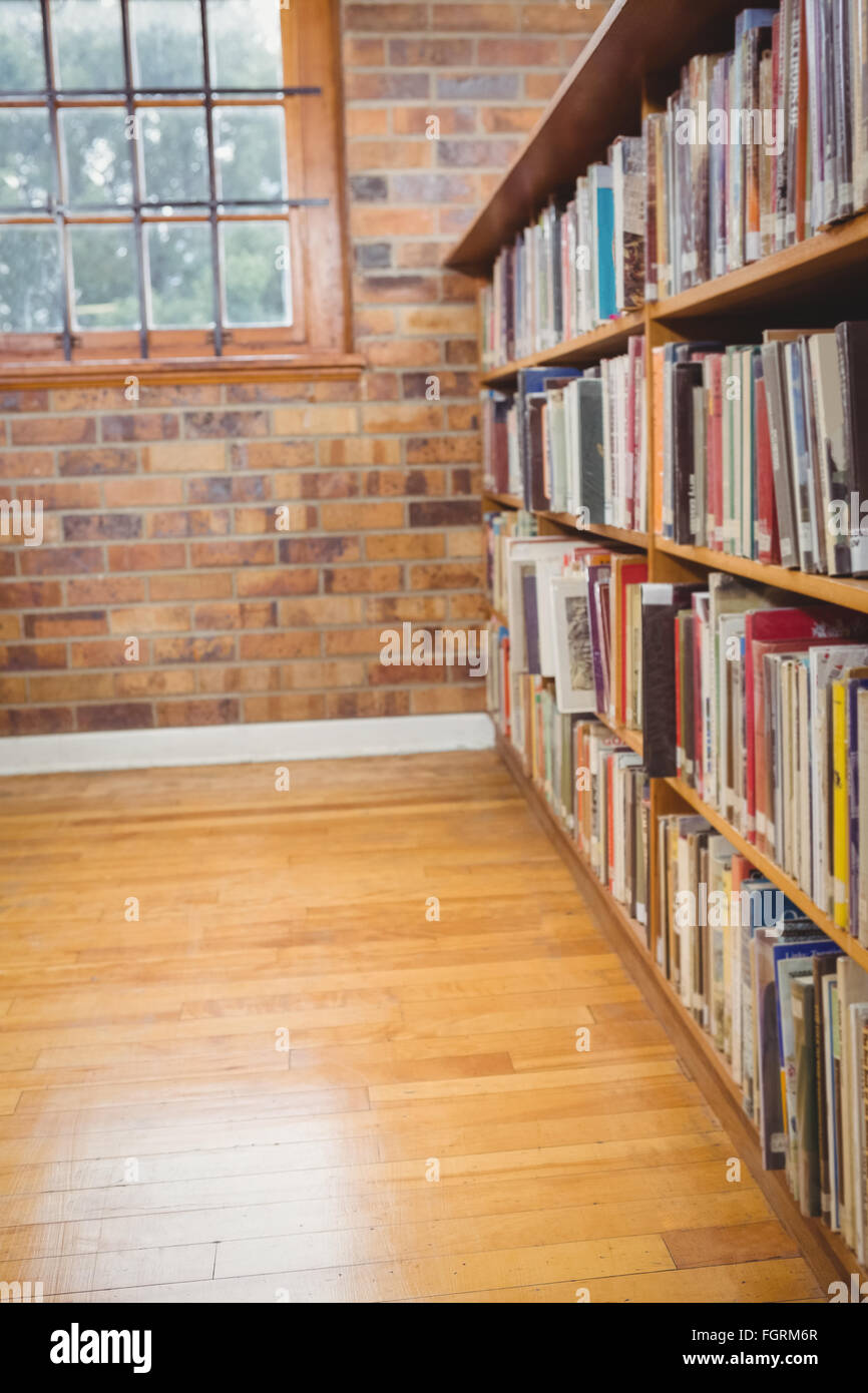 Four Shelves full of books Stock Photo - Alamy