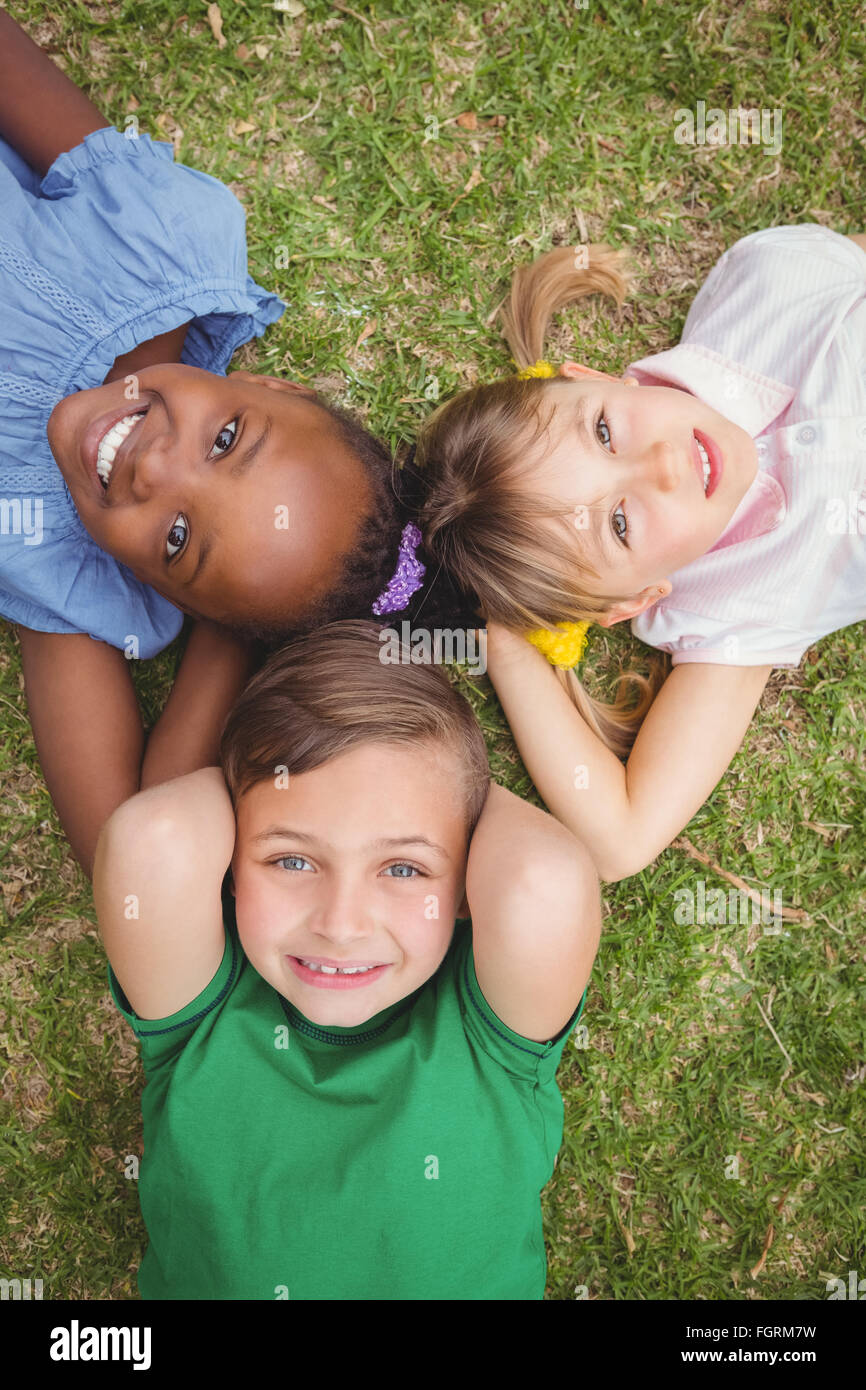 Smiling students looking at the camera Stock Photo - Alamy