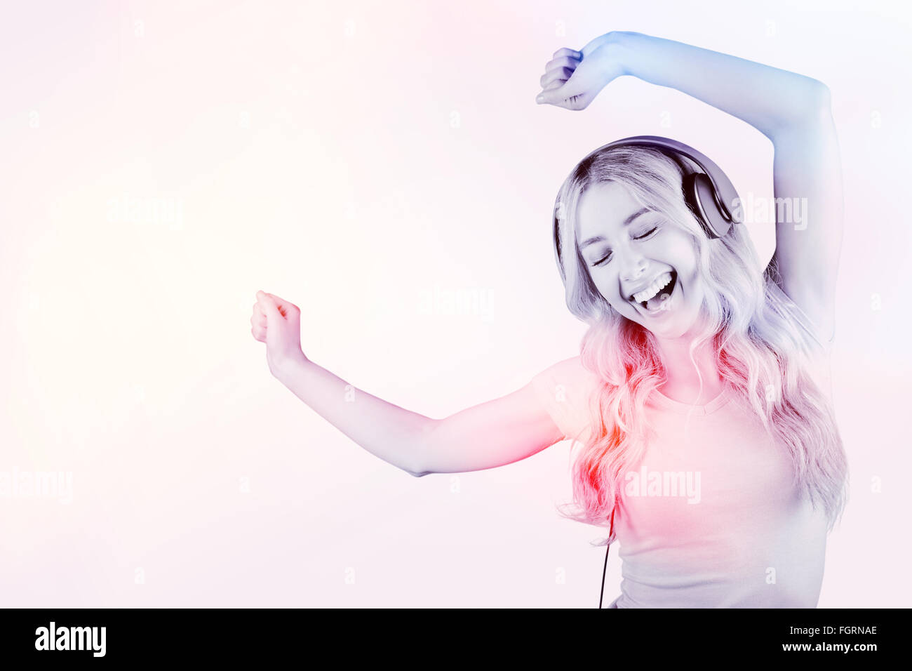 Happy woman headphones dancing in hi-res stock photography and images ...