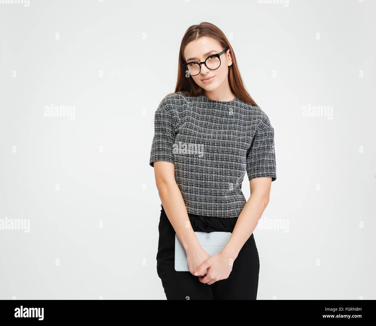 Beautiful woman standing isolated on a white background Stock Photo - Alamy