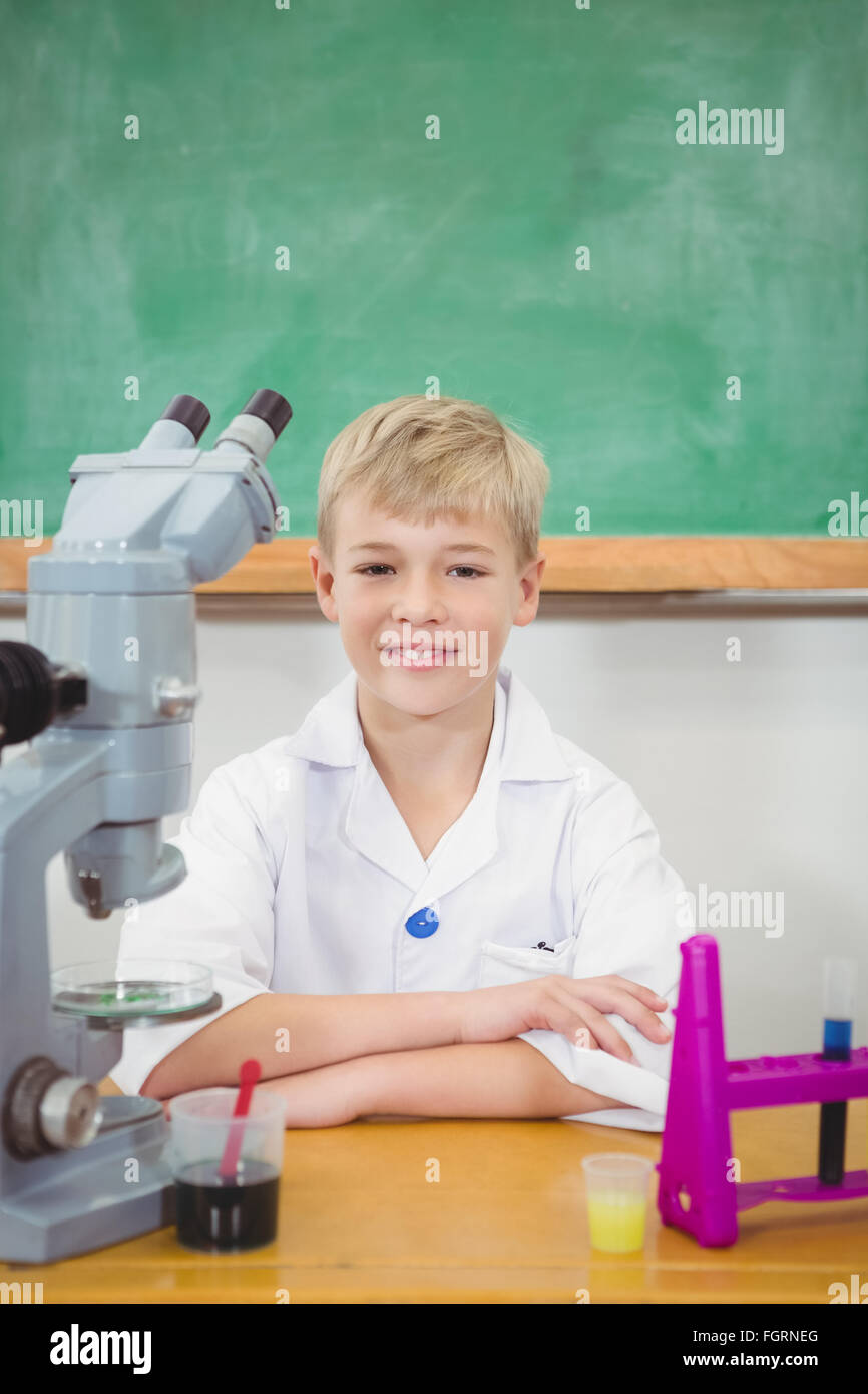 Student using a microscope and chemistry set Stock Photo - Alamy