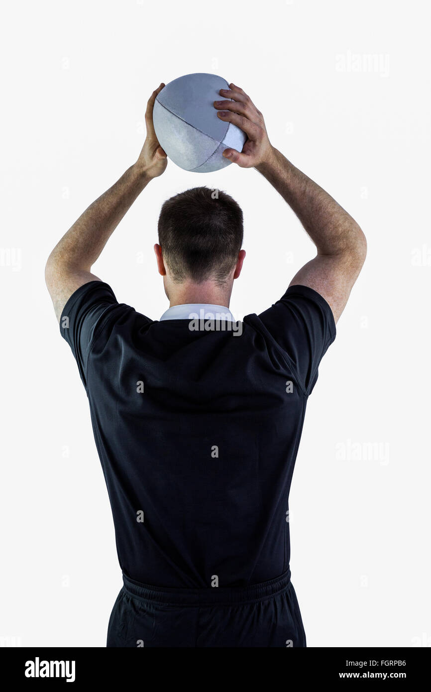 Rugby player about to throw a rugby ball Stock Photo - Alamy