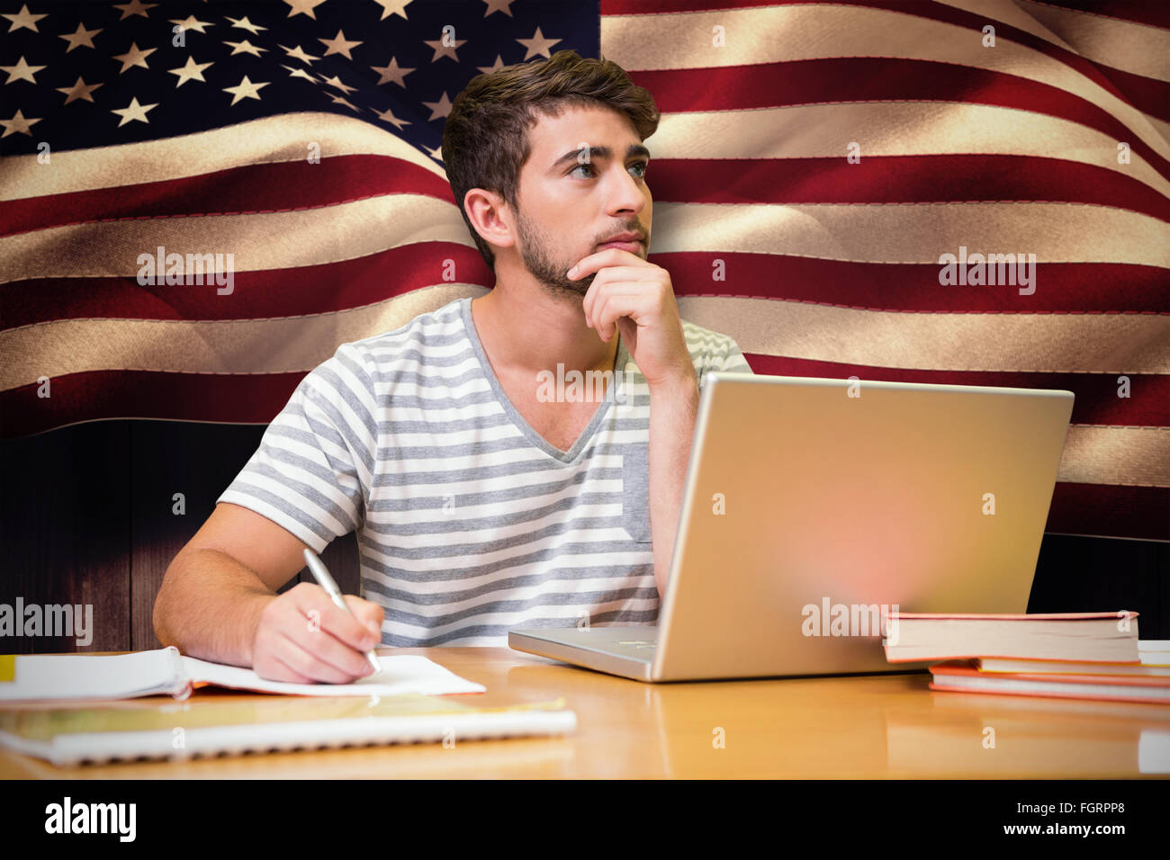 Composite image of student studying in the library with laptop Stock ...