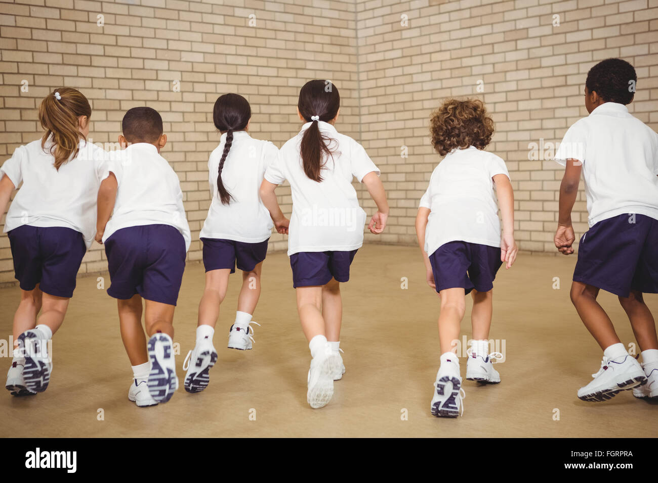 Students running across the court Stock Photo - Alamy