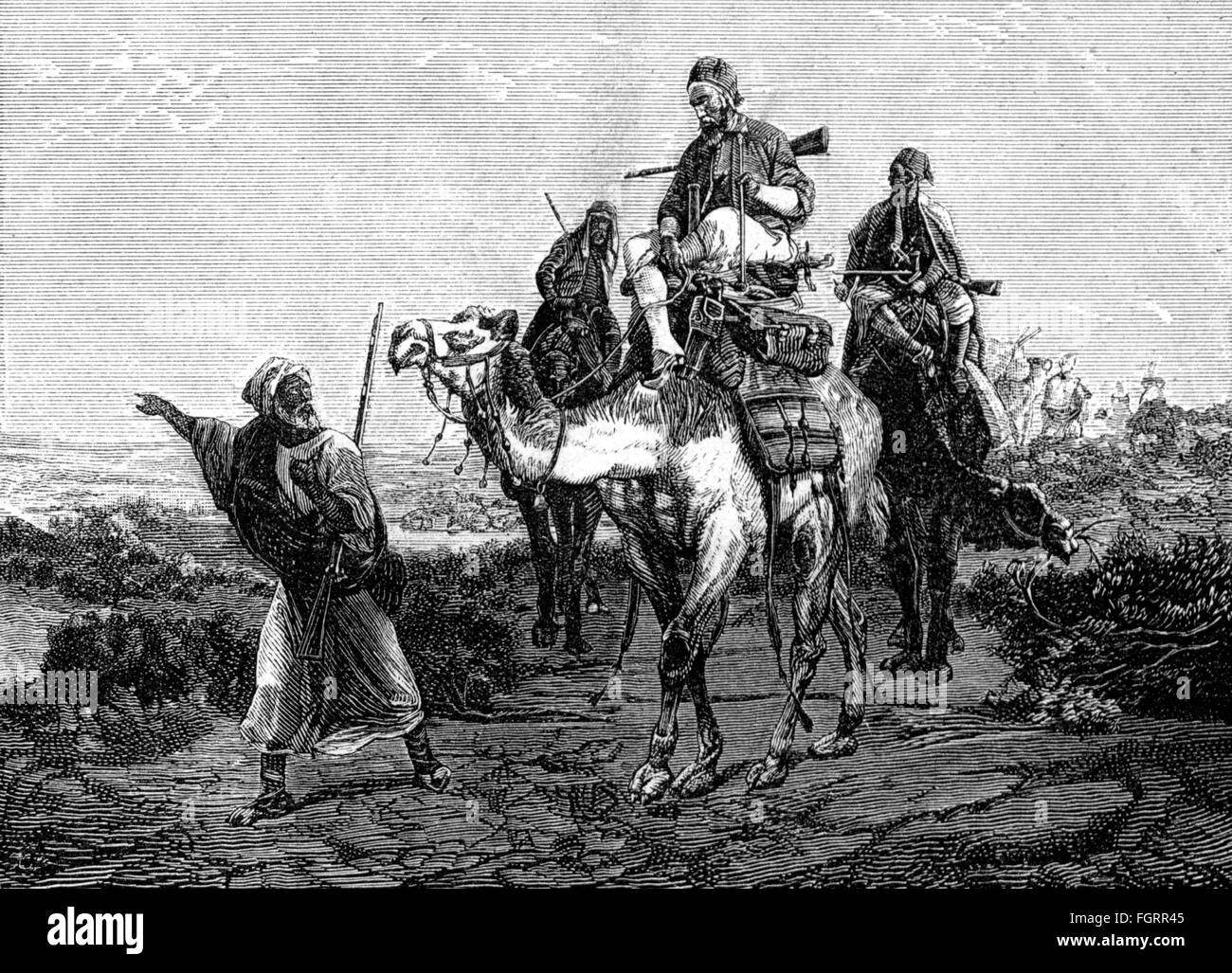 Desert caravan camels guide Black and White Stock Photos & Images - Alamy