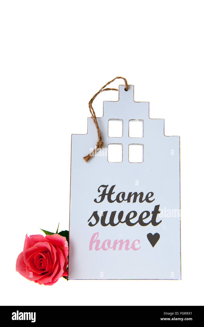 White miniature house with rose and home sweet home Stock Photo - Alamy