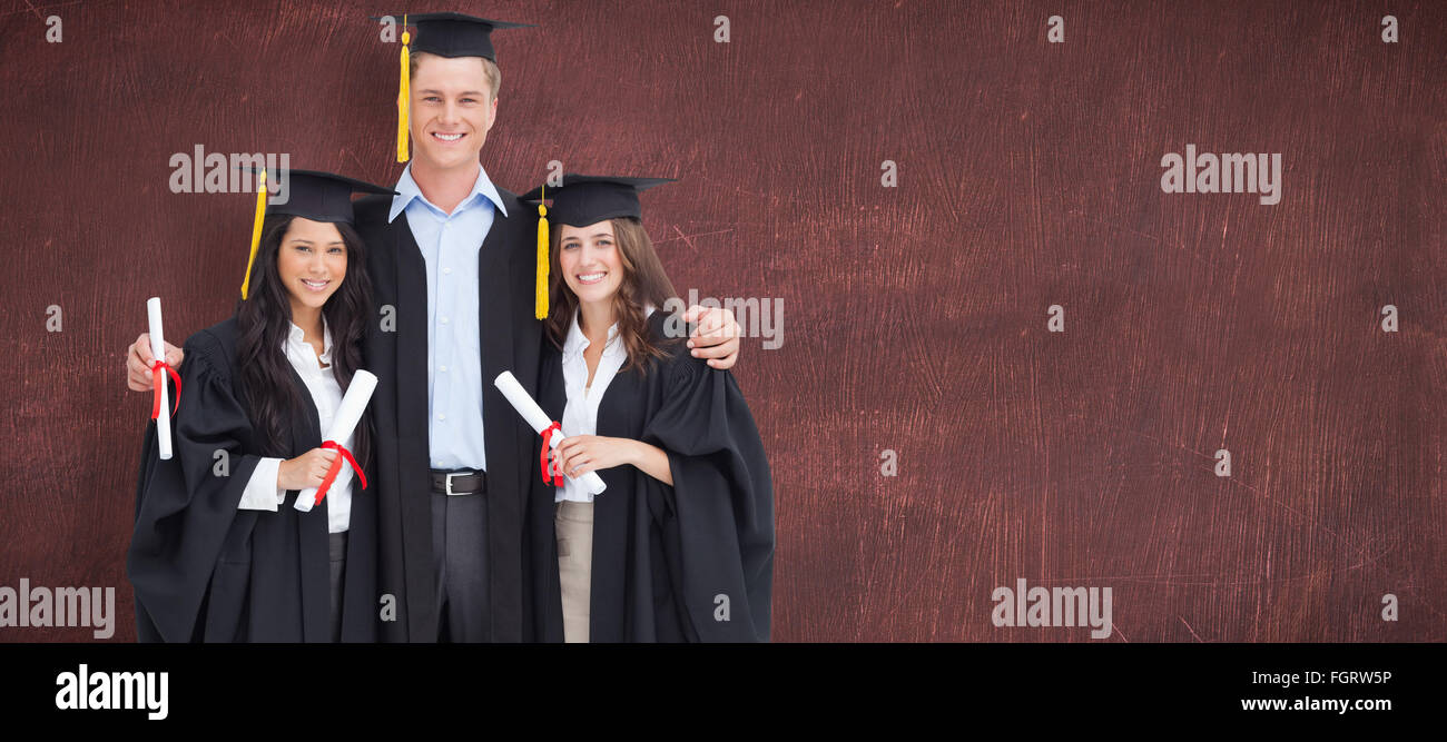 Composite image of full length of three friends graduate from college ...