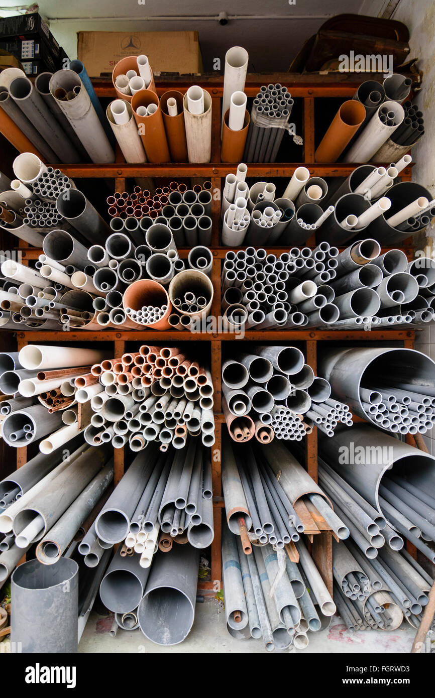 Detail of various sizes of pipes in old shophouse store along Joo Chiat ...