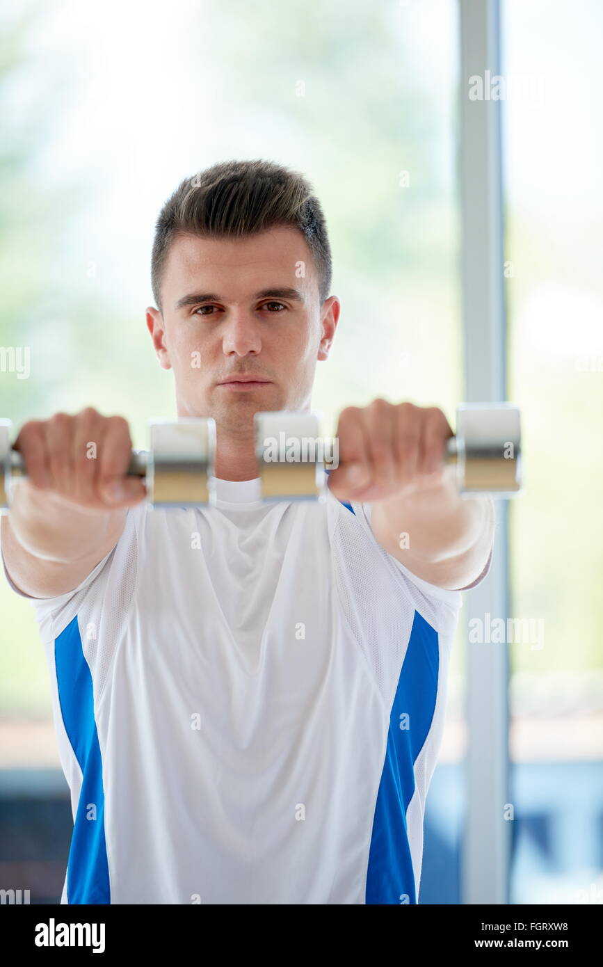 Boy lifting weights hi-res stock photography and images - Alamy