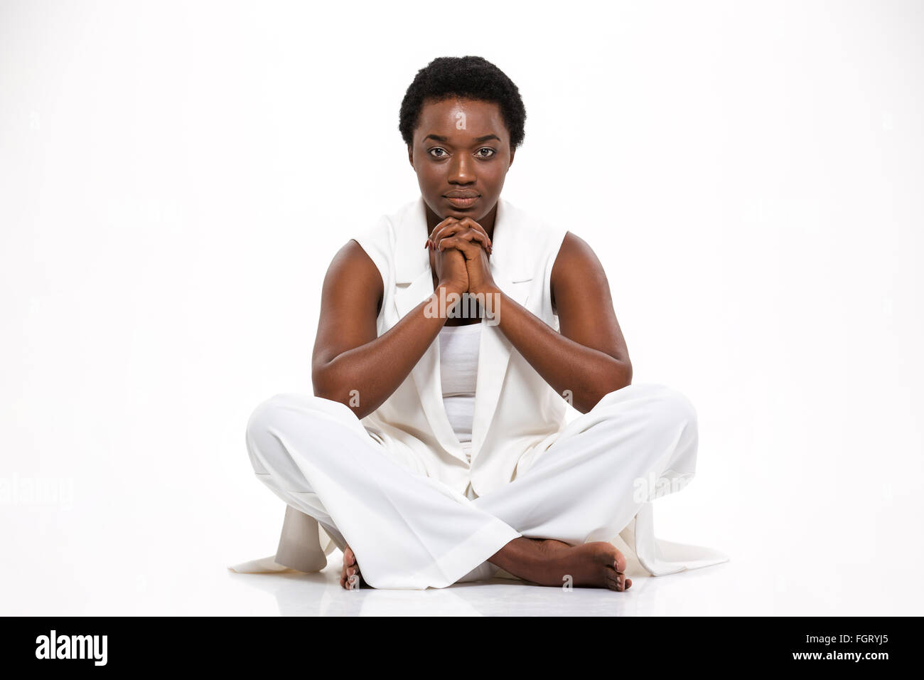 Pretty woman sitting legs crossed hi-res stock photography and images ...