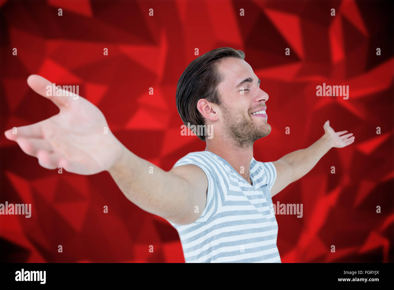 Composite image of smiling man standing arms outstretched Stock Photo ...