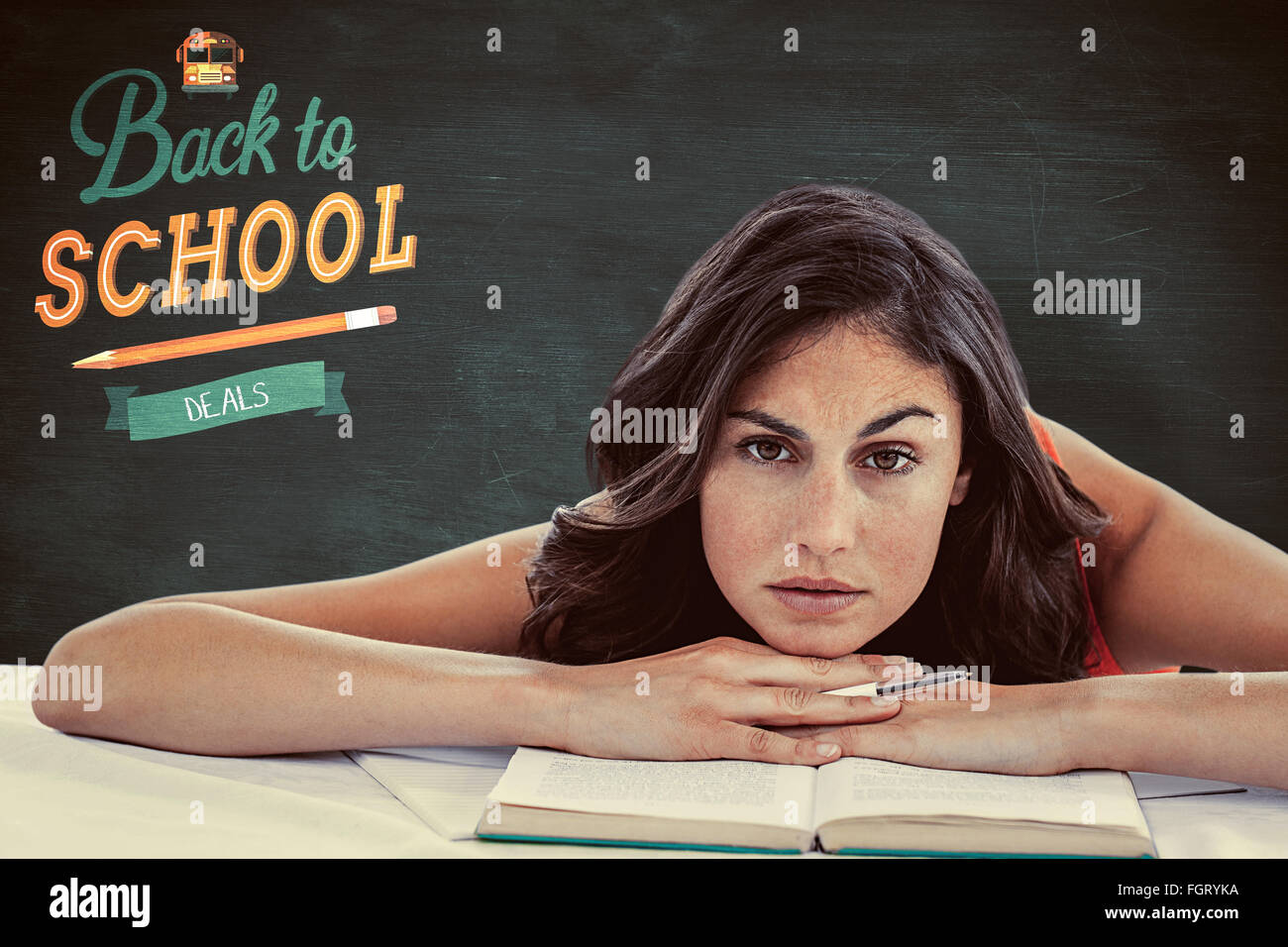Composite image of frowning student head on her books Stock Photo - Alamy