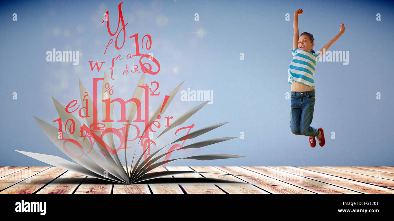 Composite image of cute little girl jumping up Stock Photo - Alamy