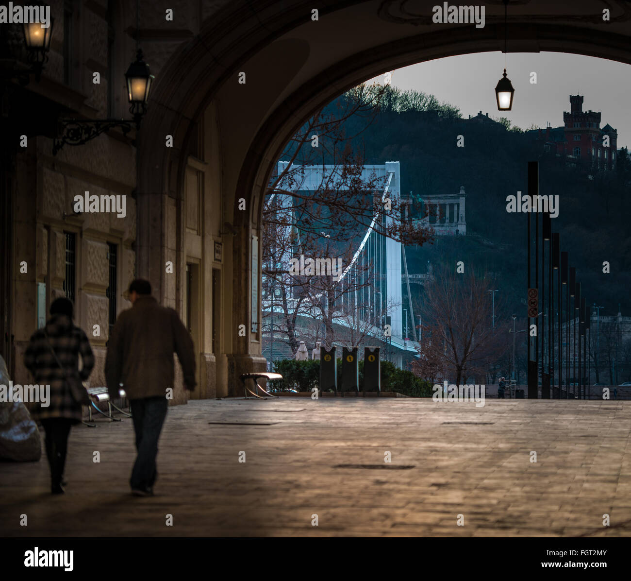 Walking through arch hi-res stock photography and images - Alamy