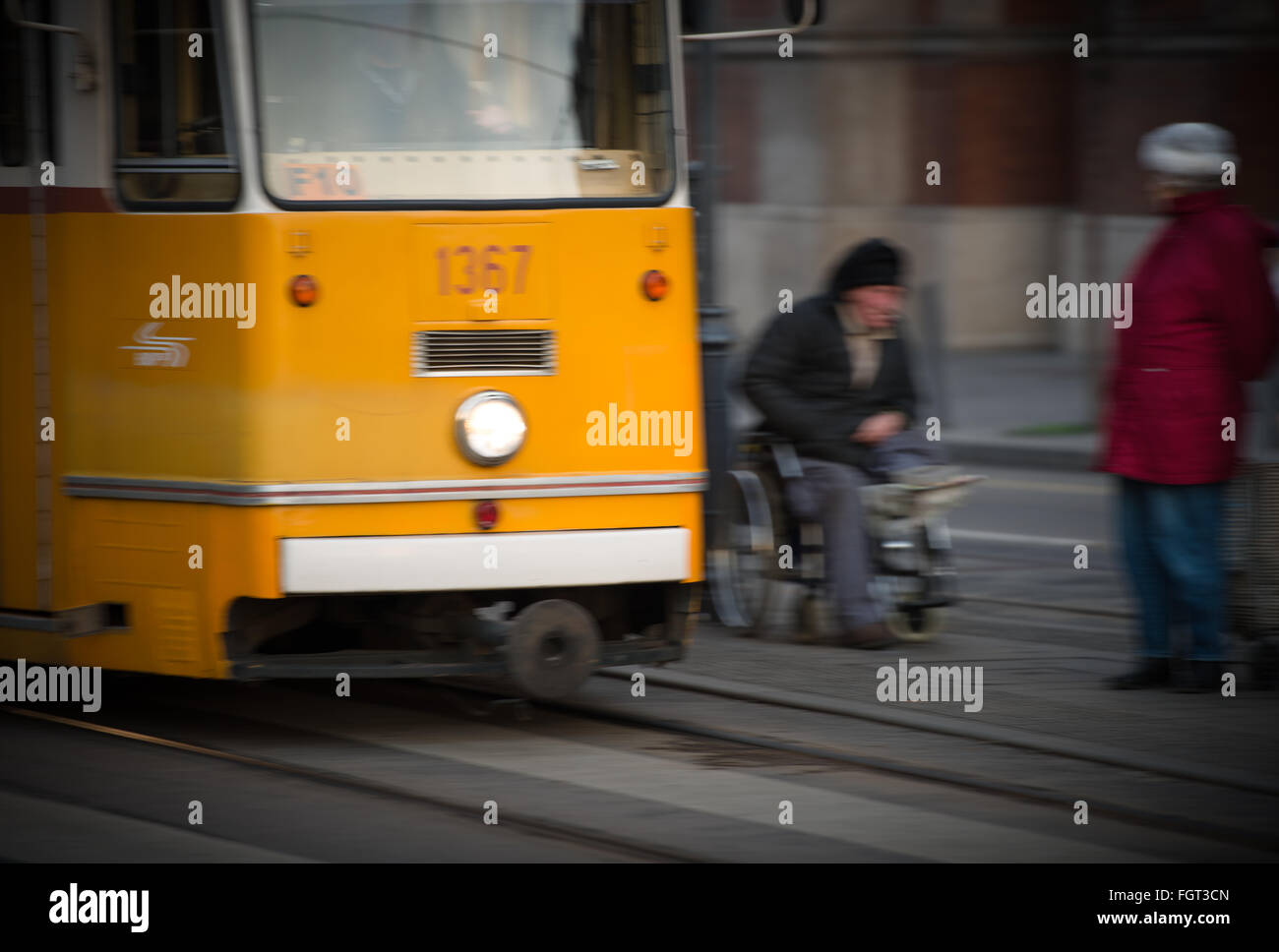 Homeless in street of Budapest, Hungary, Europe. Motion blur, yellow ...